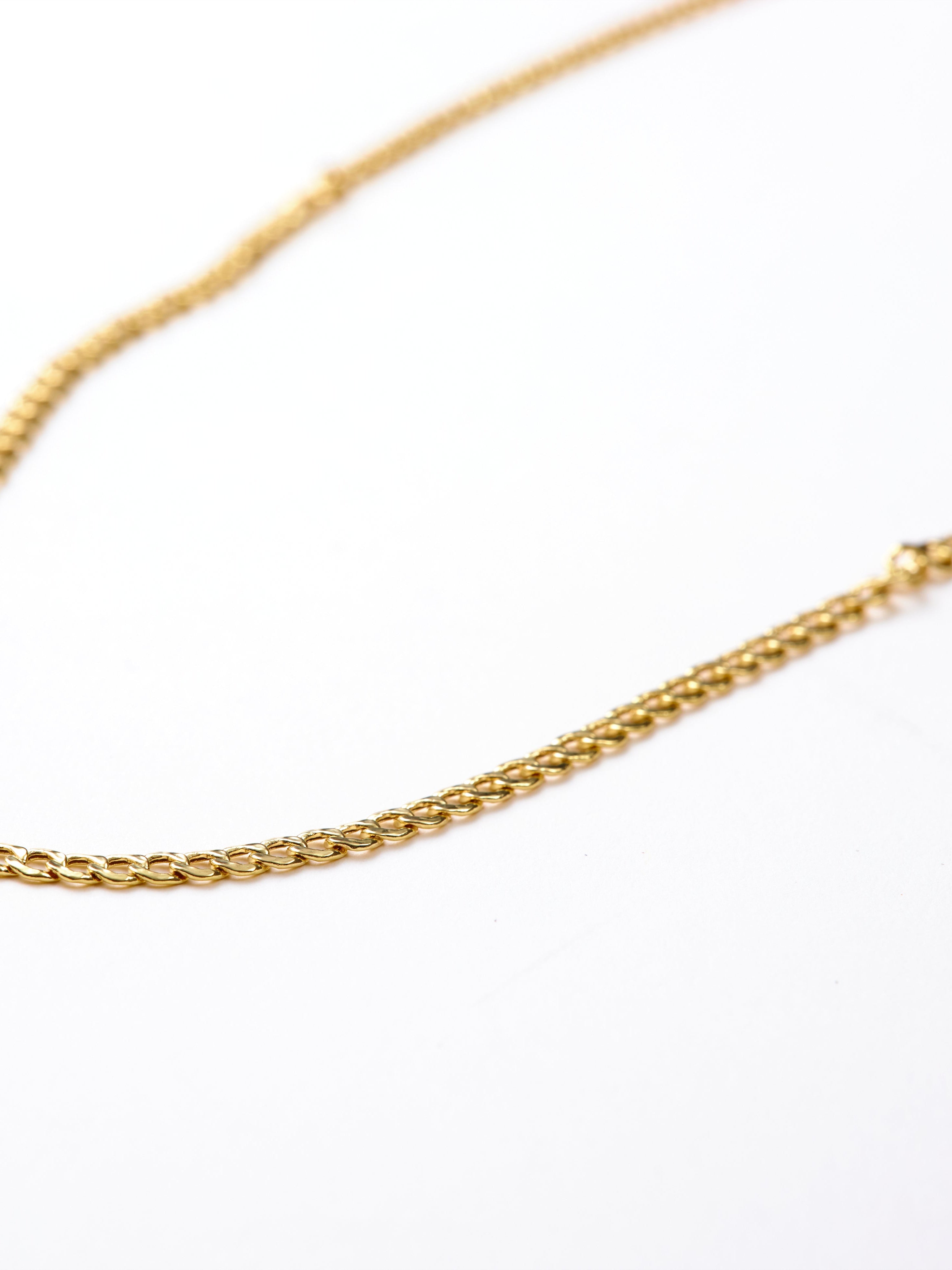 Crafted in 14K semi-solid gold, this understated Curb Chain can be worn ...